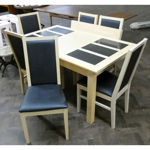 A modern light beech extending dining table with centre leav... | Barnebys