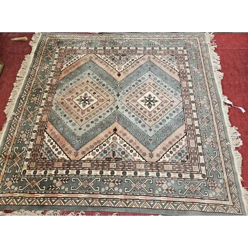 A green ground Carpet with multi borders and unique central ... | Barnebys